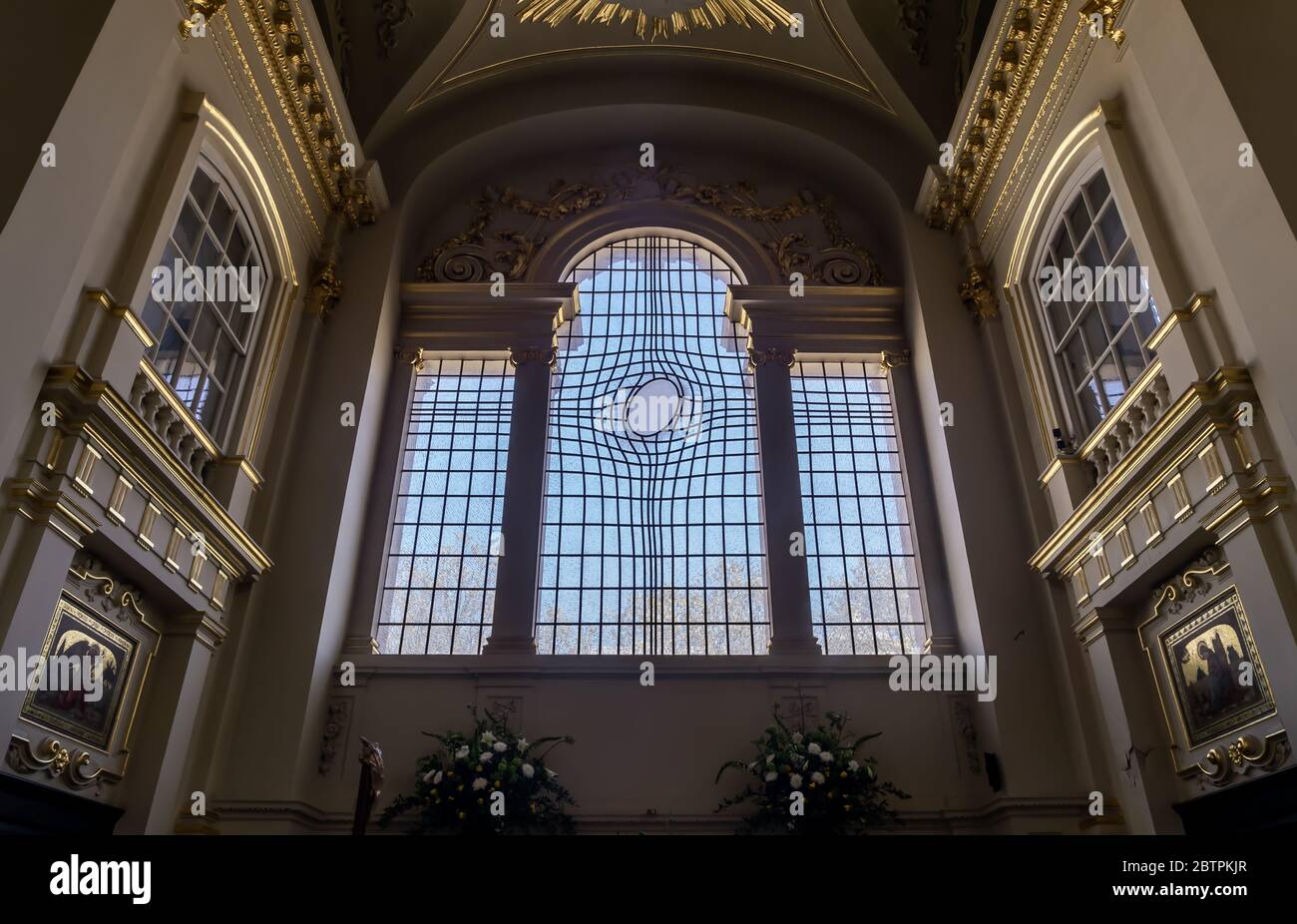 LONDON, UK - APR 19, 2019 : Leaded glass window at St. Martin in the ...
