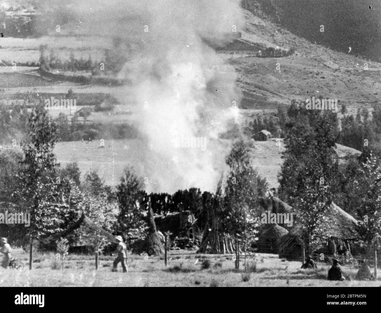 Bombing of Dessye . A bomb bursting as it dropped in the town of Dessye ...