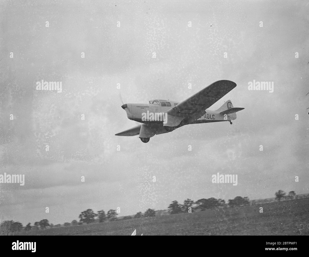 Tommy Rose landing his Miles M.3B Falcon Six ( G-ADLC ) the winner of ...