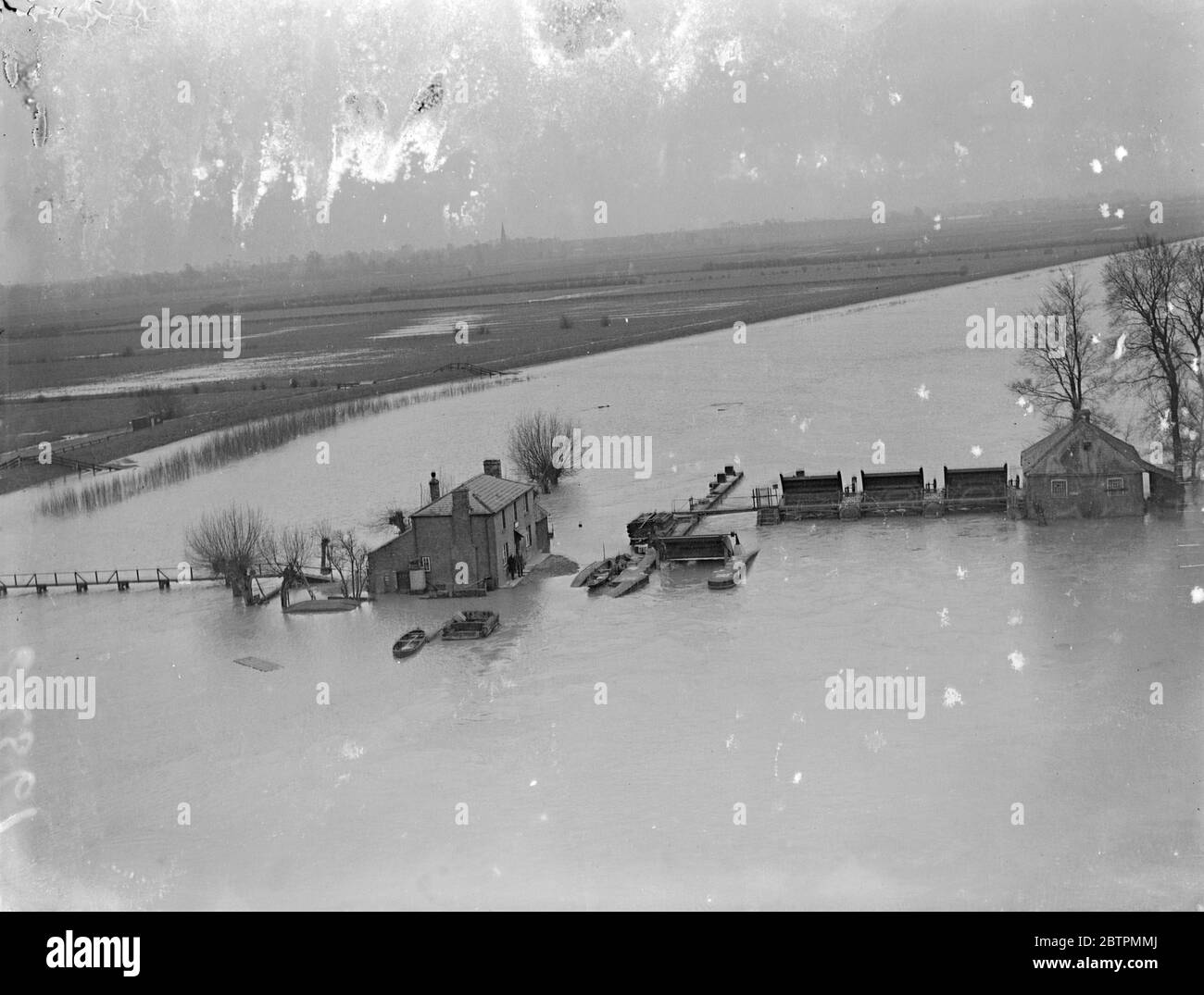 Picture from the air . Floods grow worse in Fen Country . Two hundred ...