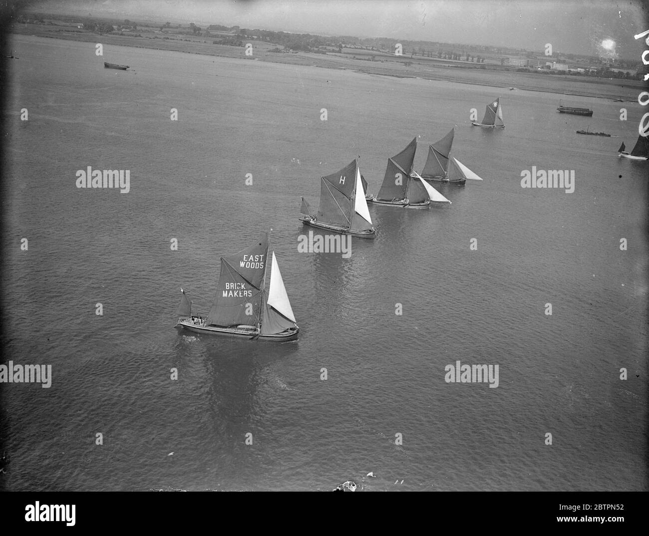 Picture from the air. Sailing barges in race on the Thames. 18 ...