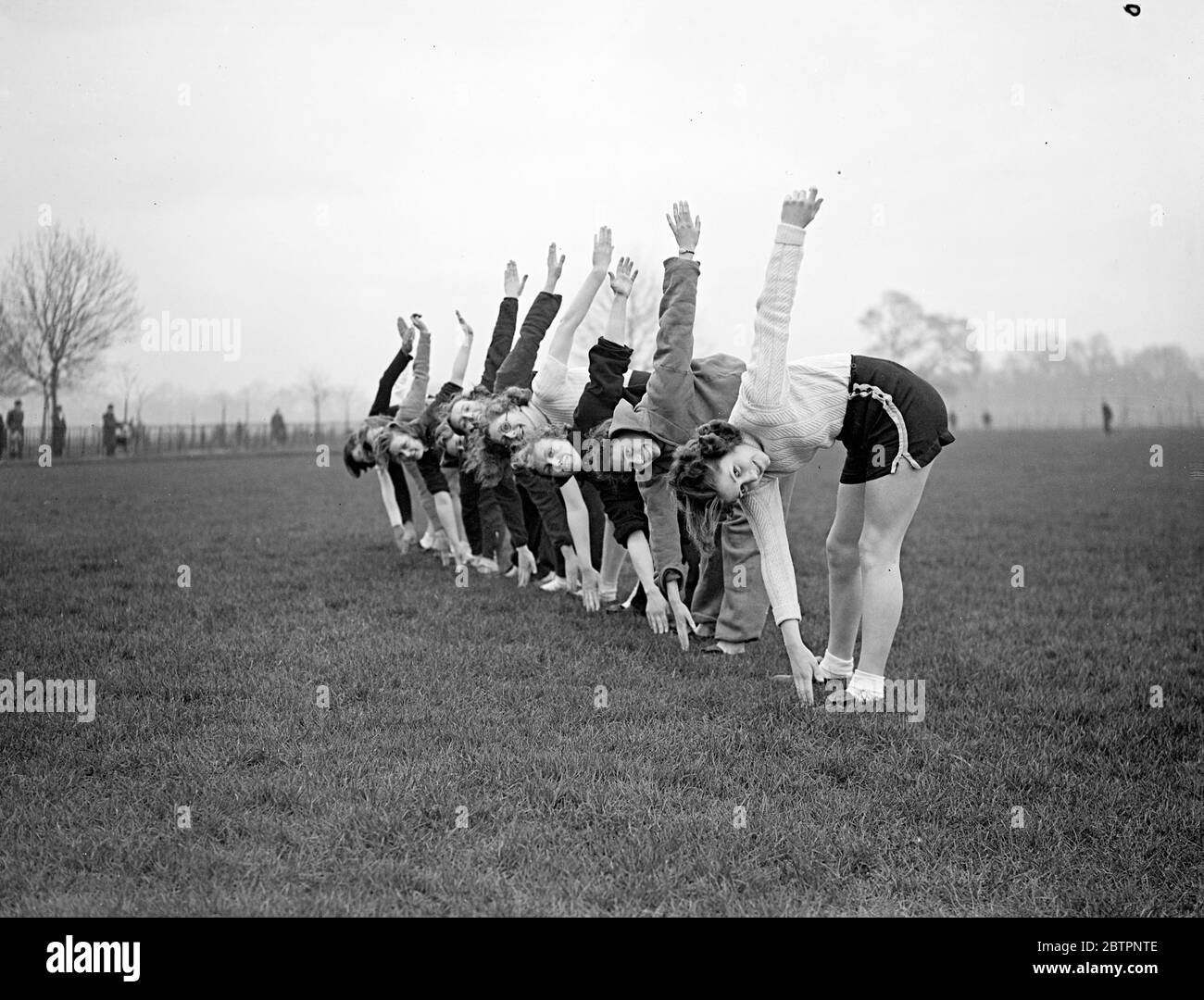 Limbering up exercises Black and White Stock Photos & Images - Alamy