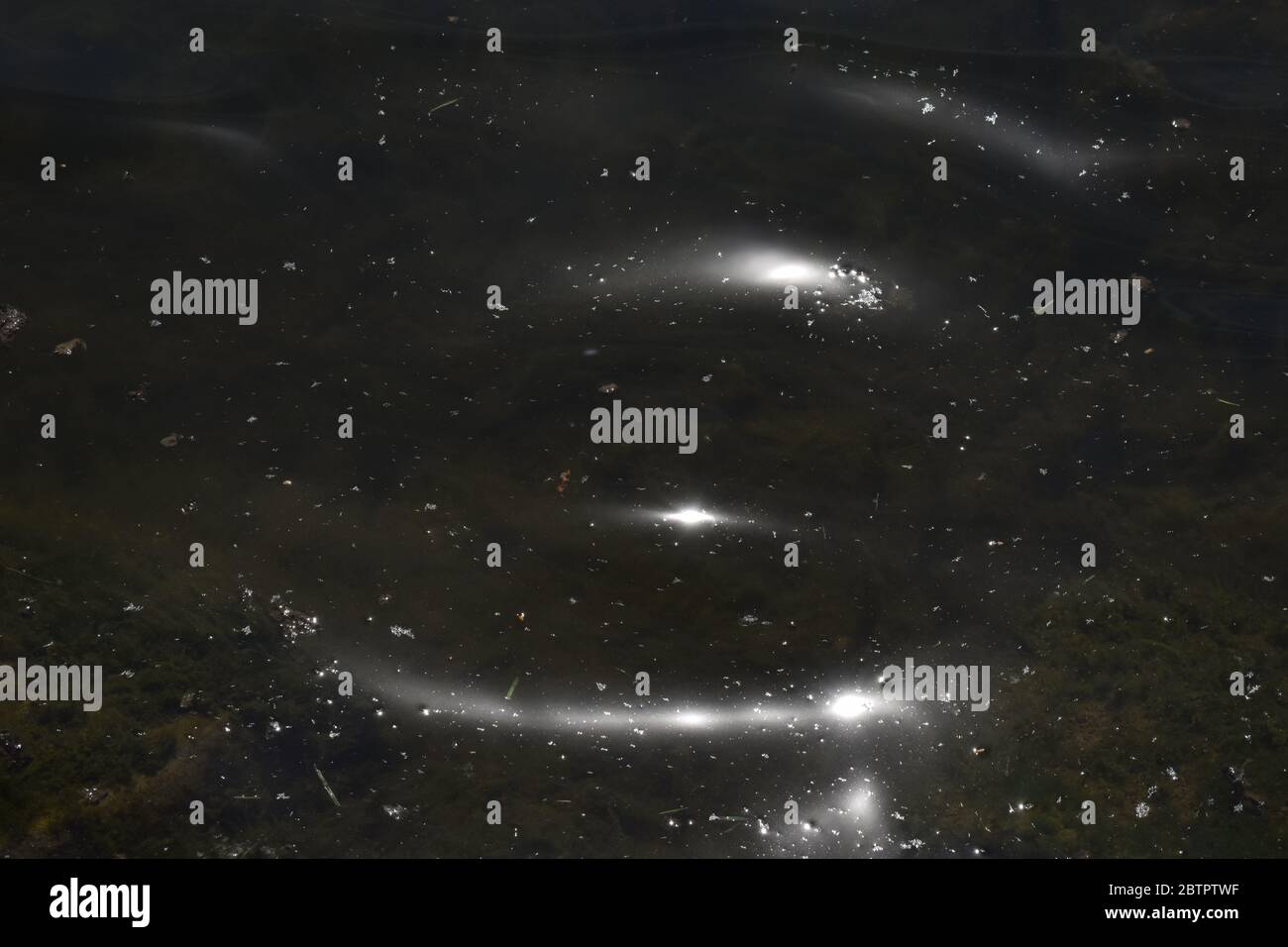 reflections in dark water Stock Photo - Alamy