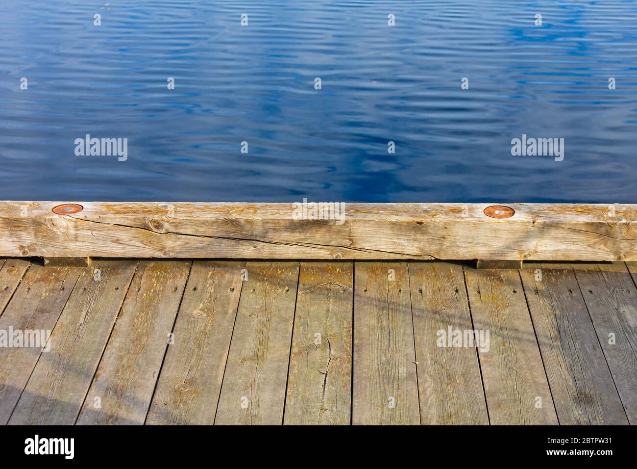 Wooden Decking Patio Terrace at Water Edge Stock Photo - Alamy