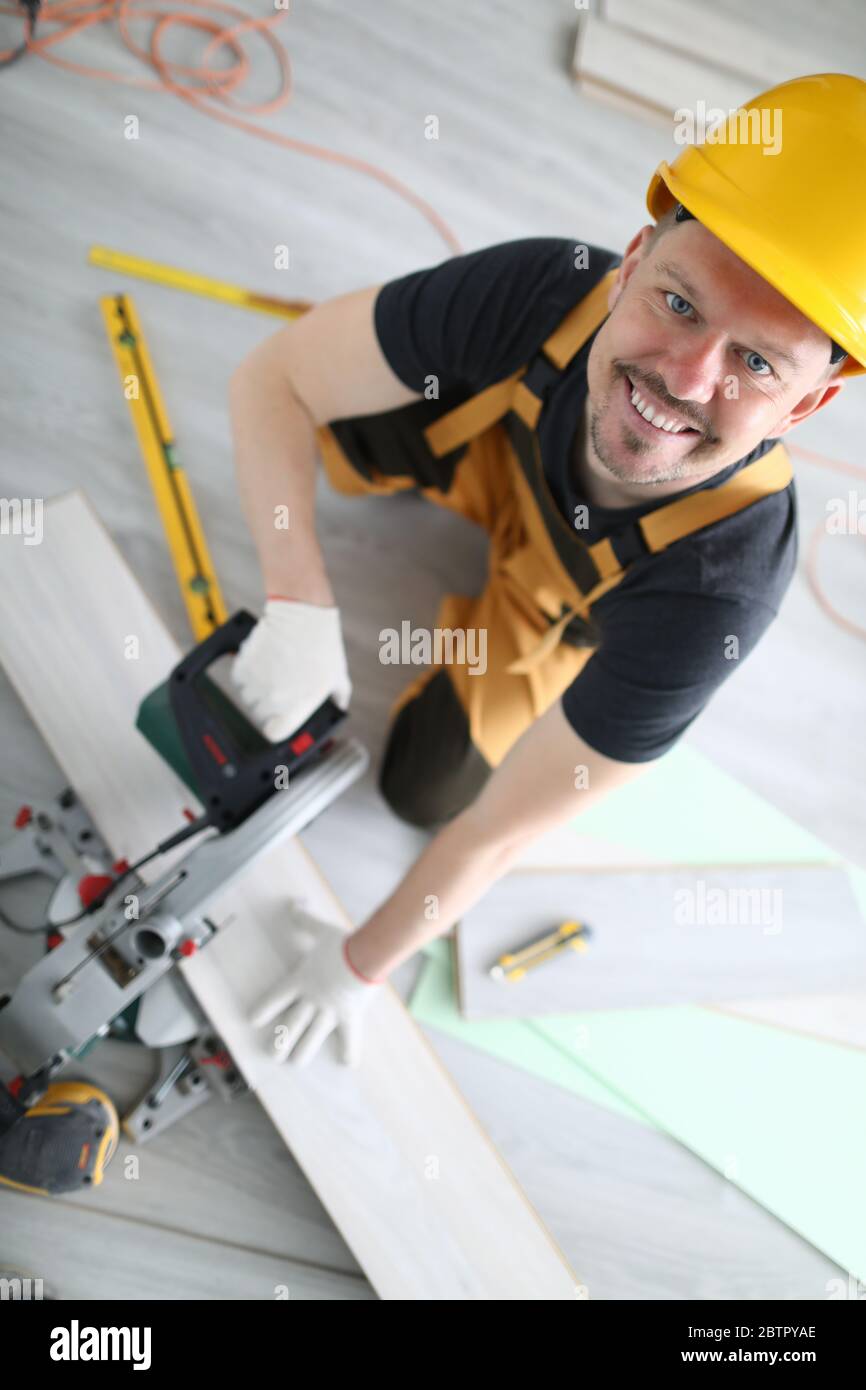 Joyful handyman at work Stock Photo - Alamy