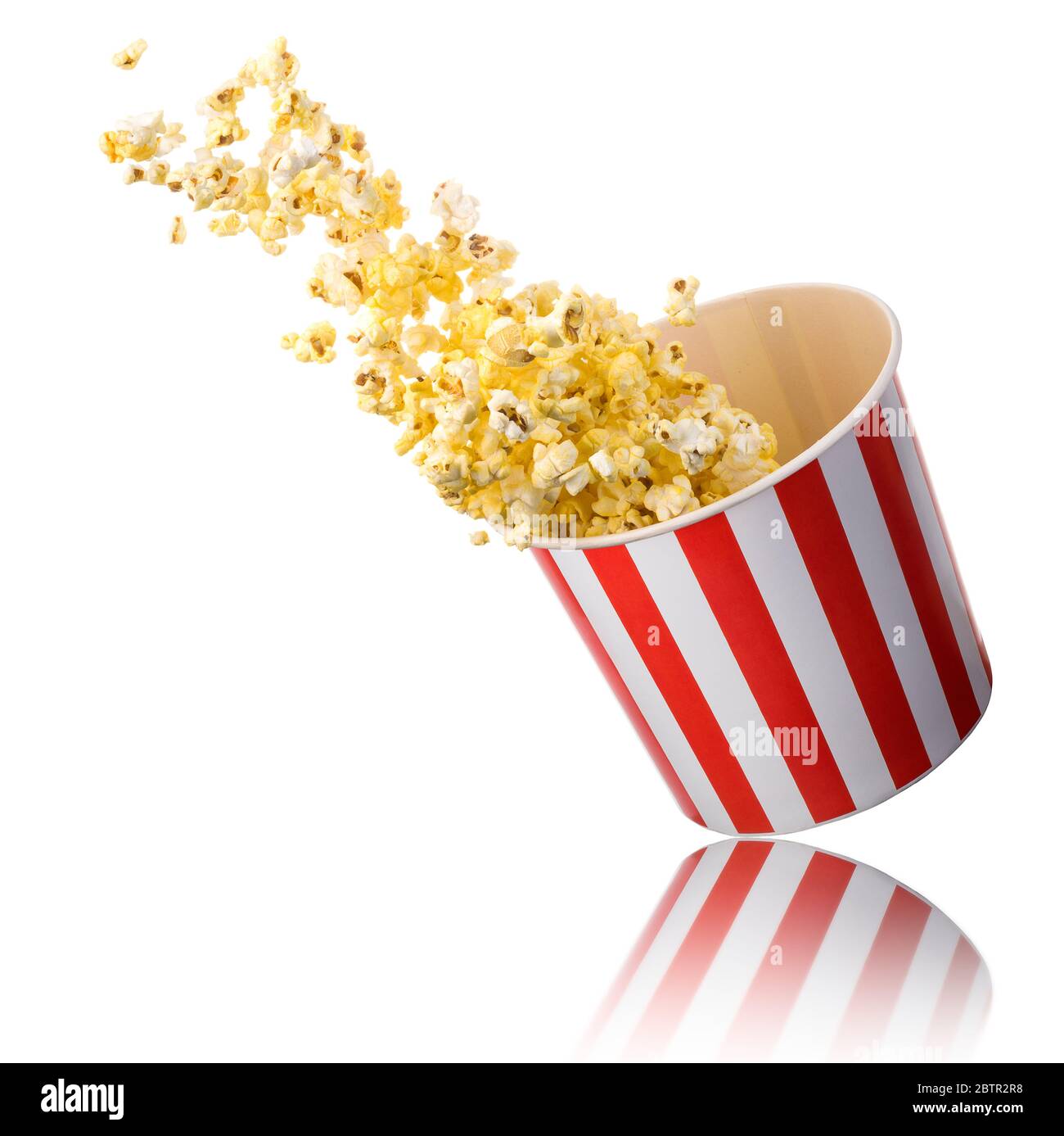 Flying popcorn from paper striped bucket isolated on white background ...