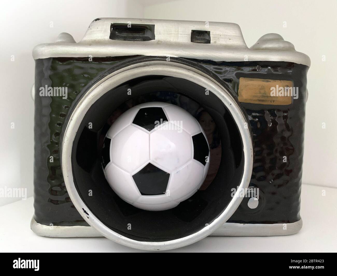 photo camera and soccer ball Stock Photo - Alamy