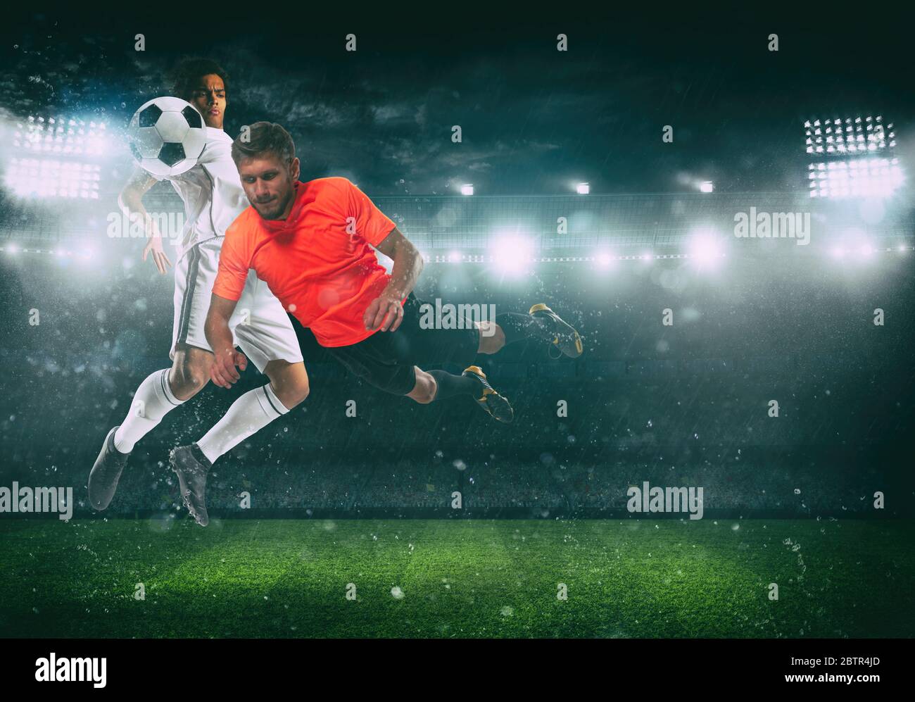 Battle to compete for the ball between two soccer players at the ...