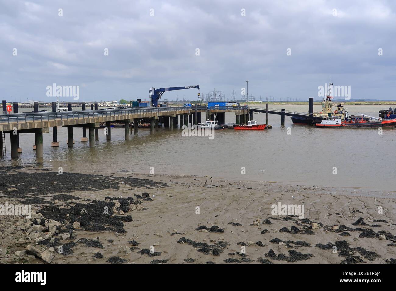 Industrial pier overlooking the river Thames at Gravesend Stock Photo ...