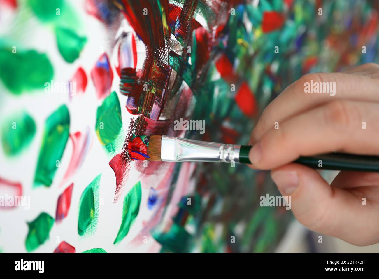 Artists hand paints future painting, abstraction Stock Photo - Alamy