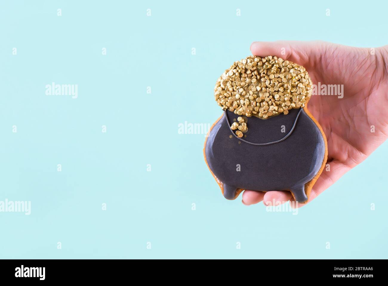 Three gingerbread in the navof of money on an abstract background of ...