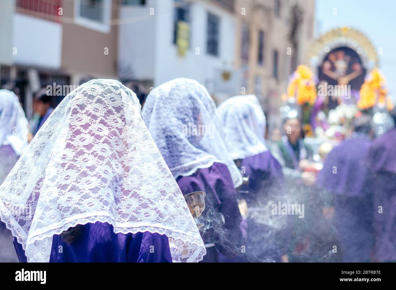 Female incense burners following the procession of the Lord of Miracles ...