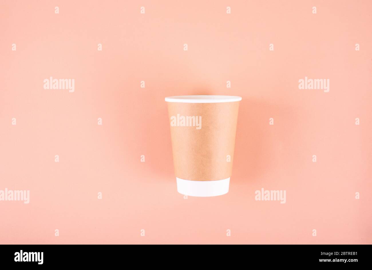Paper glass with drinking tubes. Eco utensils on a light background ...