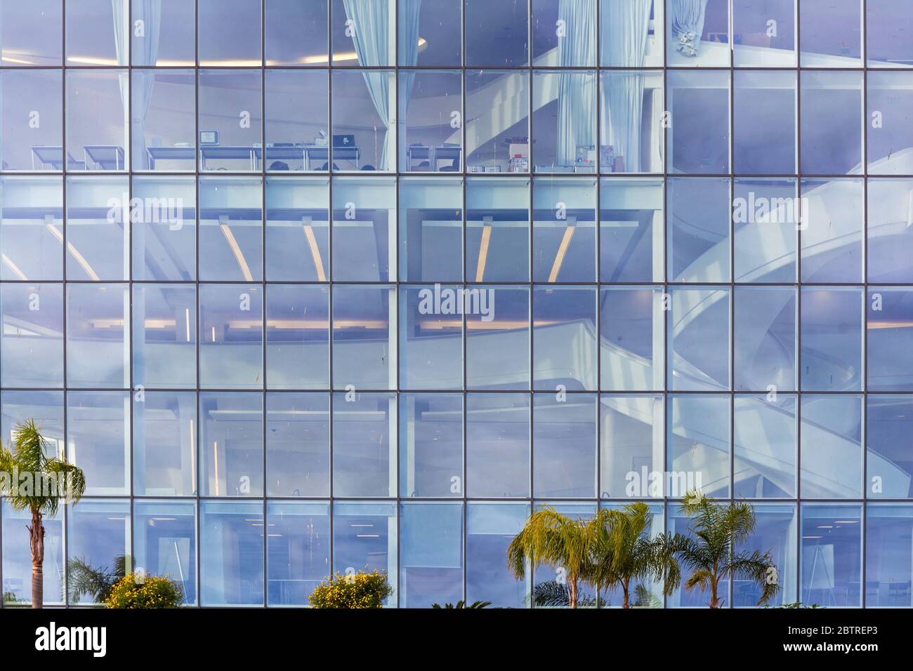 Big Blue Glass Windows at Modern Building Stock Photo - Alamy