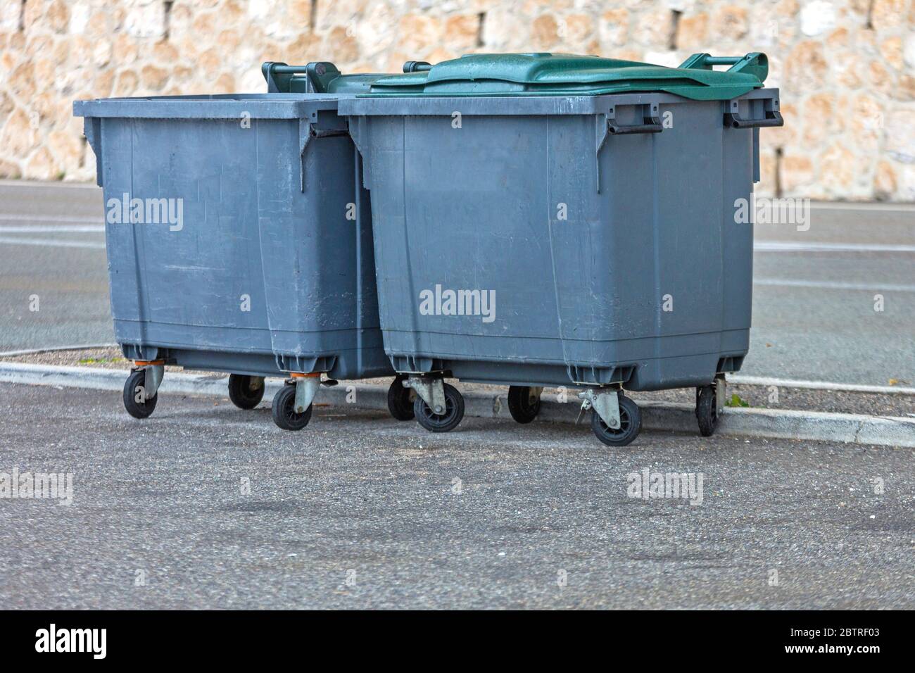 Two Dumpster Bins Containers at Street in France Stock Photo - Alamy