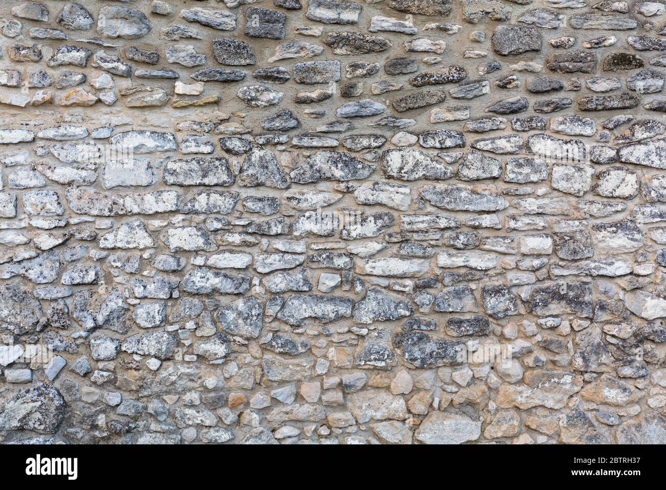 Rough stone wall texture france hi-res stock photography and images - Alamy