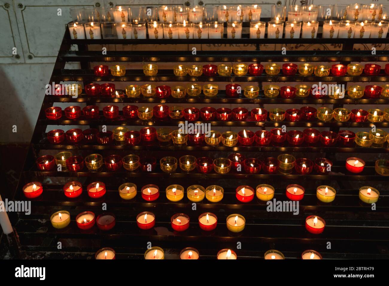 Votive Candles Rack in Marseille Church Stock Photo - Alamy