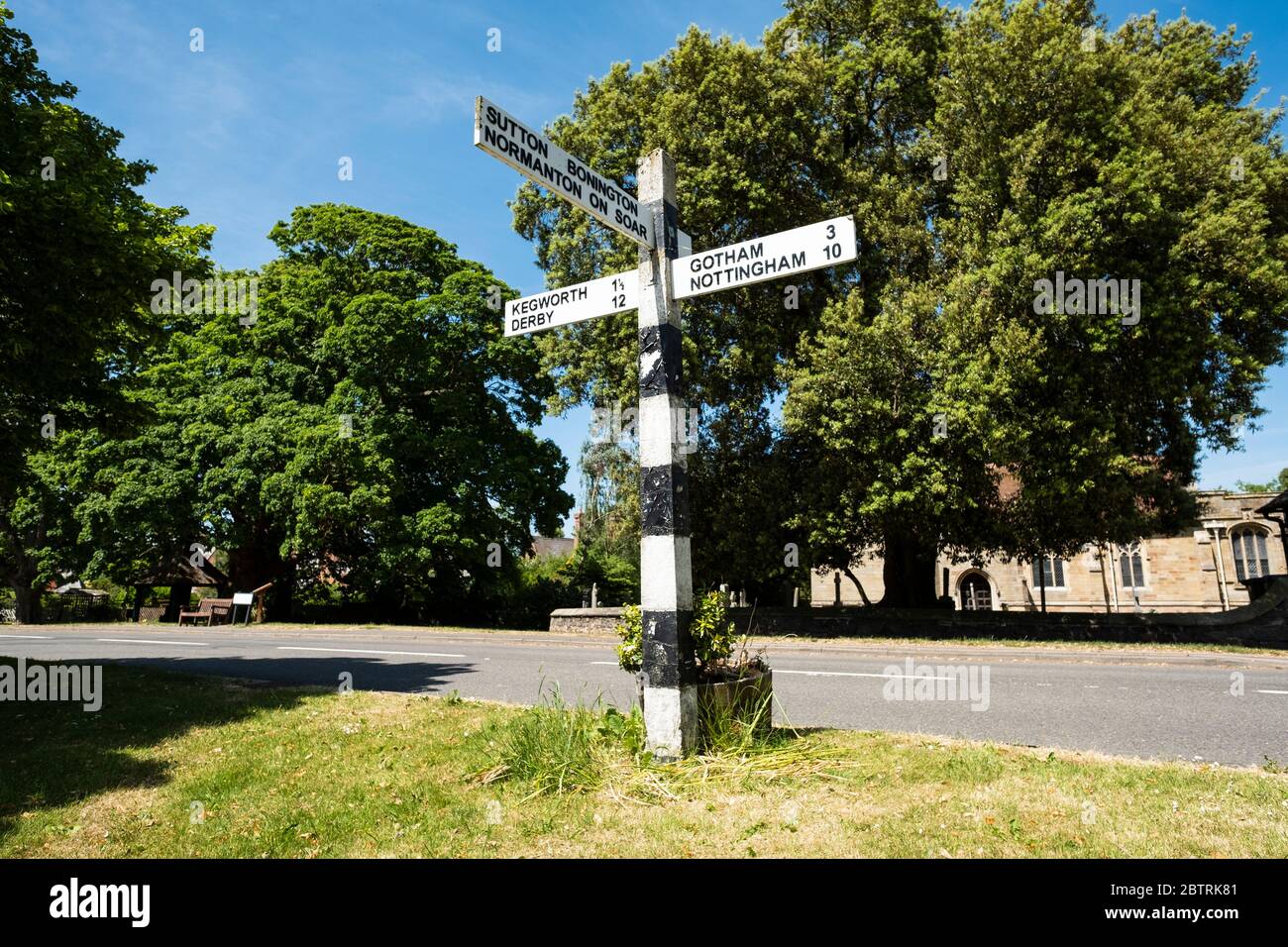 Old village mileage signpost example Stock Photo - Alamy