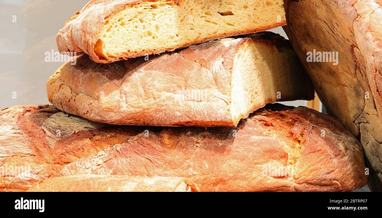 Loaves of Whole bread for sale at bakery shop Stock Photo - Alamy