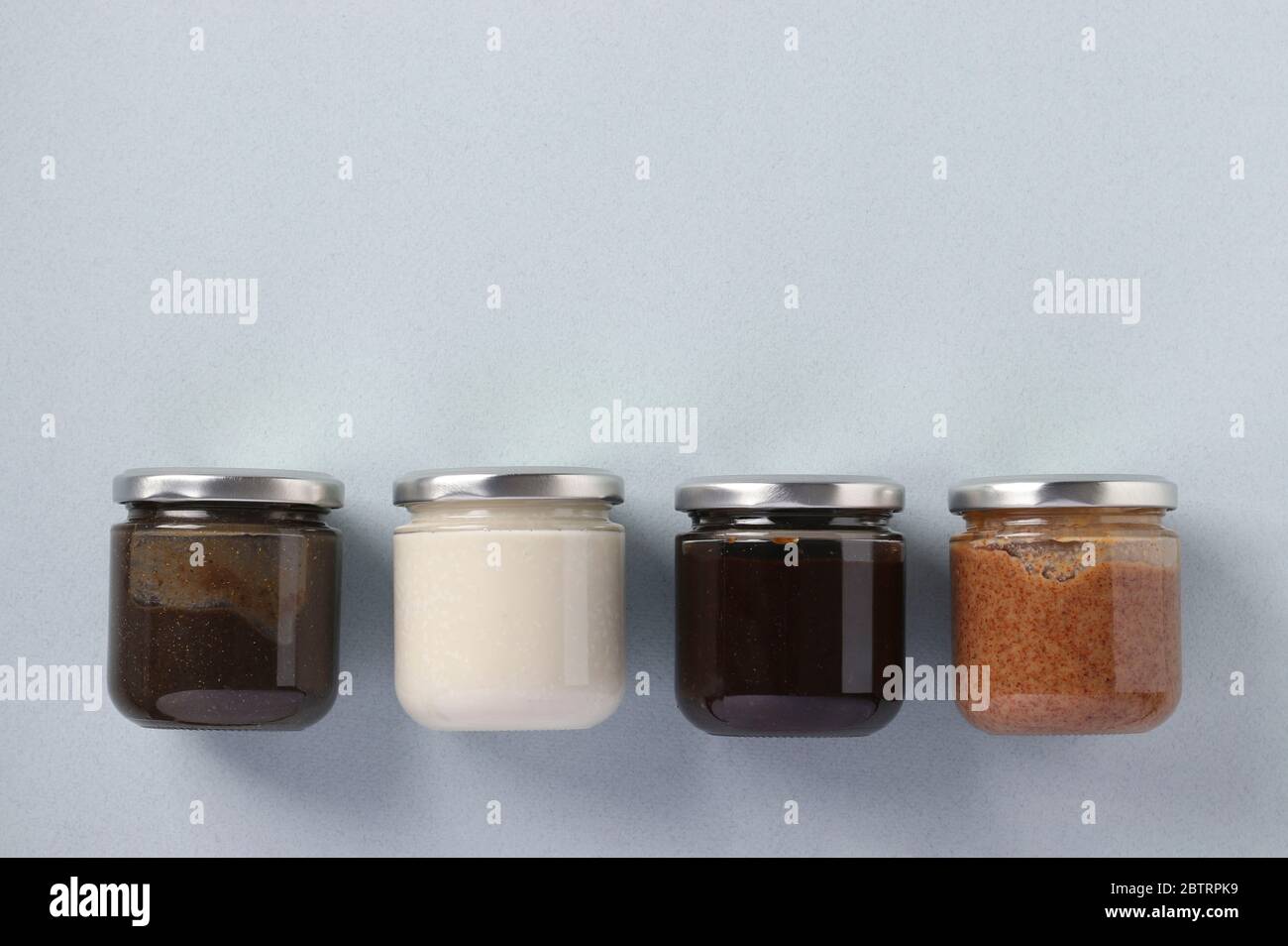 Vegan organic paste of flax seeds, milk thistle, peanuts and coconut in ...