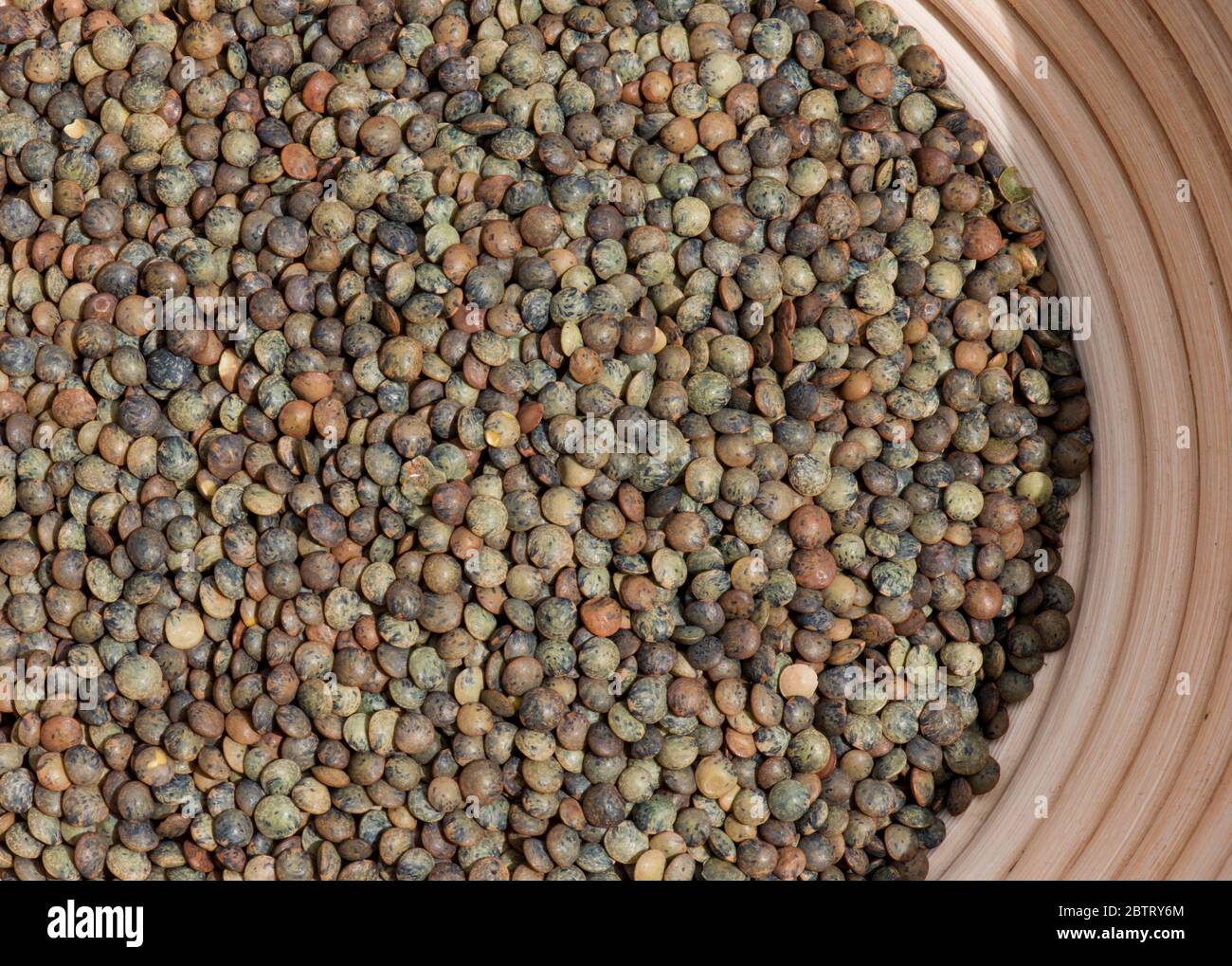 Puy lentils in circular bowl Stock Photo - Alamy