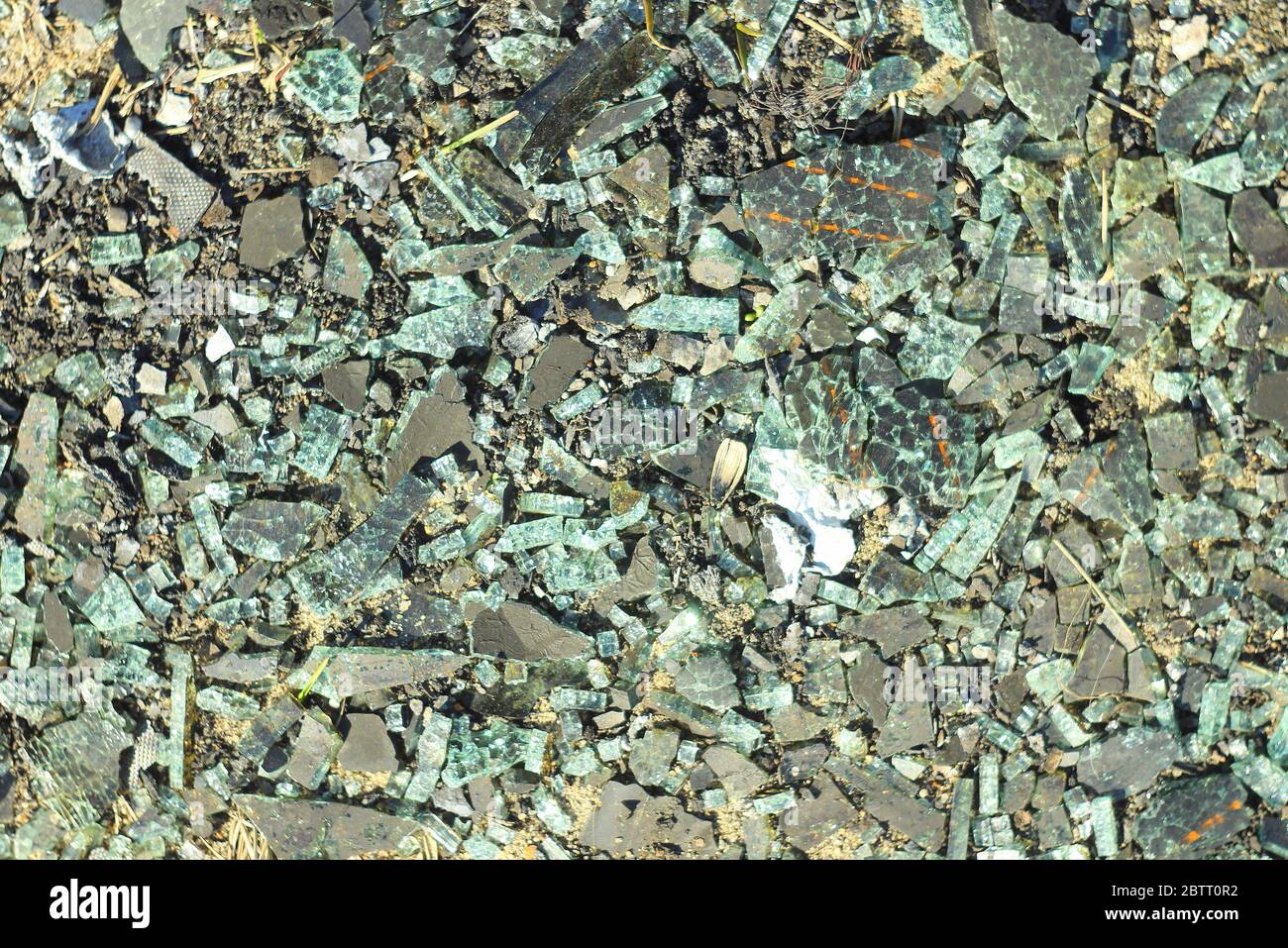 small broken glass and construction debris. Fragments of a broken ...
