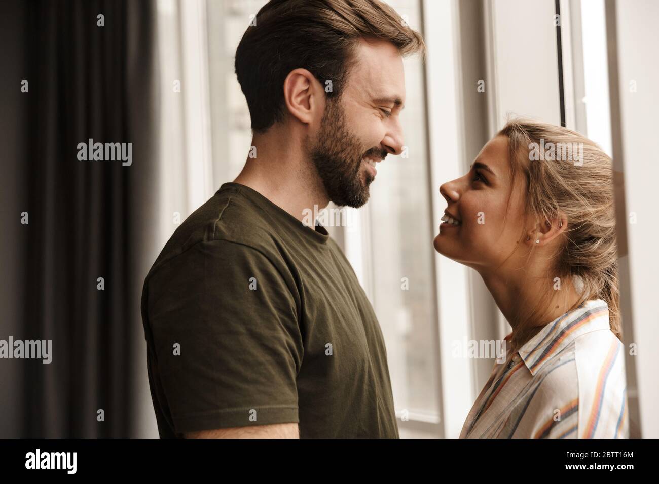 Two faces looking at each other hi-res stock photography and images - Alamy