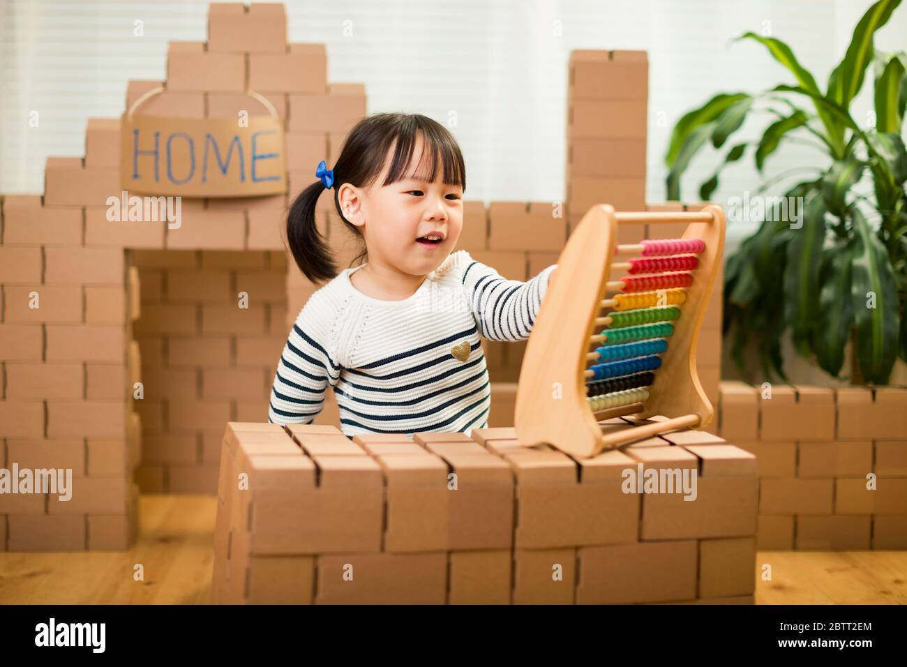 Child counting blocks hi-res stock photography and images - Alamy