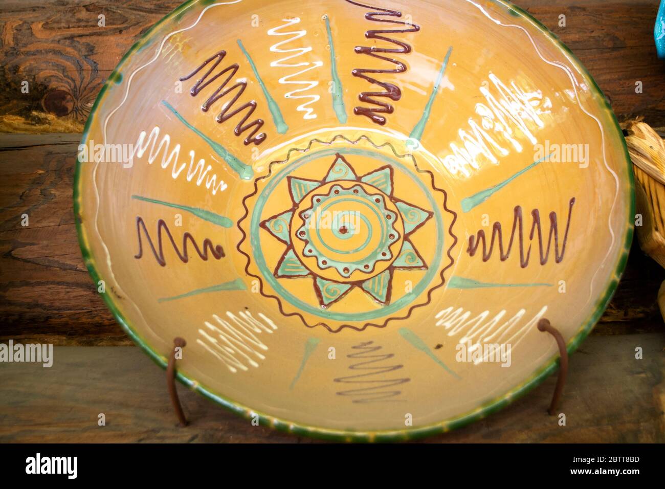 Authentic ceramic dish of Belarus with traditional pattern, on rustic ...