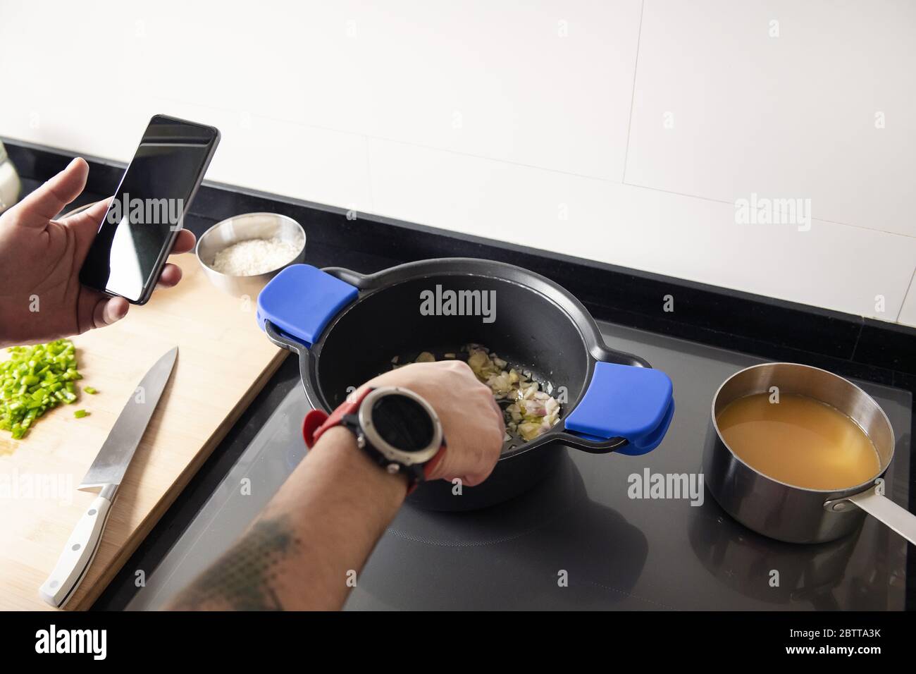 Chef holding up telephone hi-res stock photography and images - Alamy