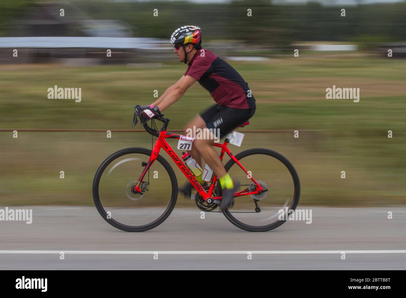 Scenic Bike Race, single rider, in full racing gear and uniform Stock ...