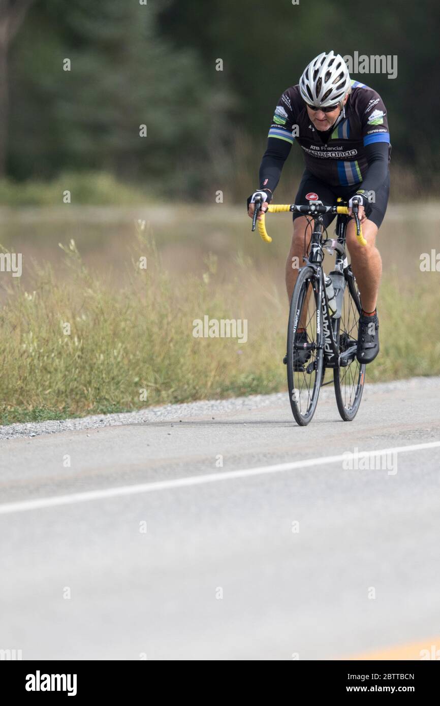 Scenic Bike Race, single rider, in full racing gear and uniform Stock ...