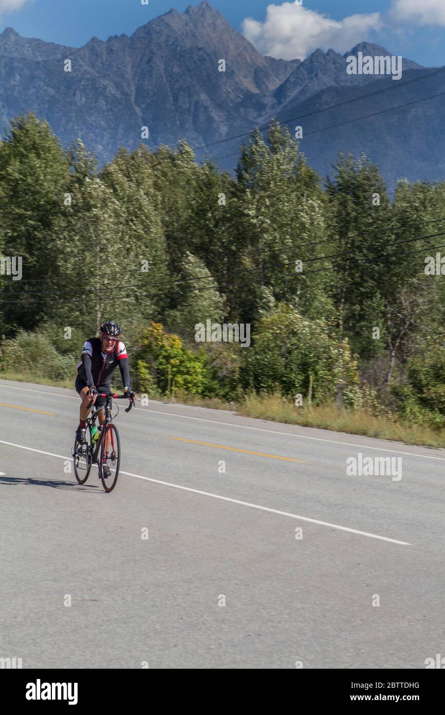 Scenic Bike Race, single rider, in full racing gear and uniform ...