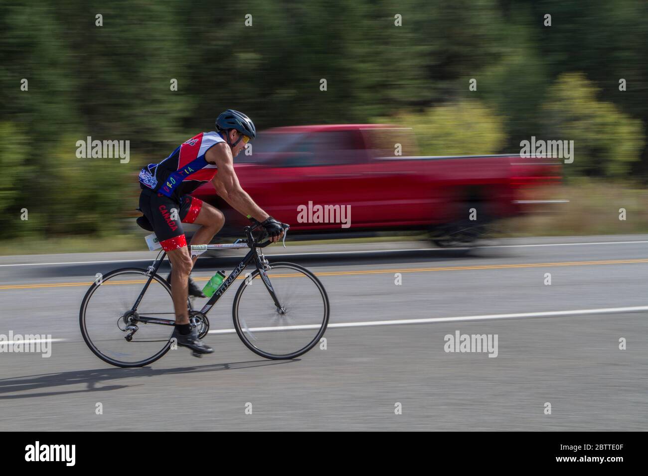Scenic Bike Race, single rider, in full racing gear and uniform ...