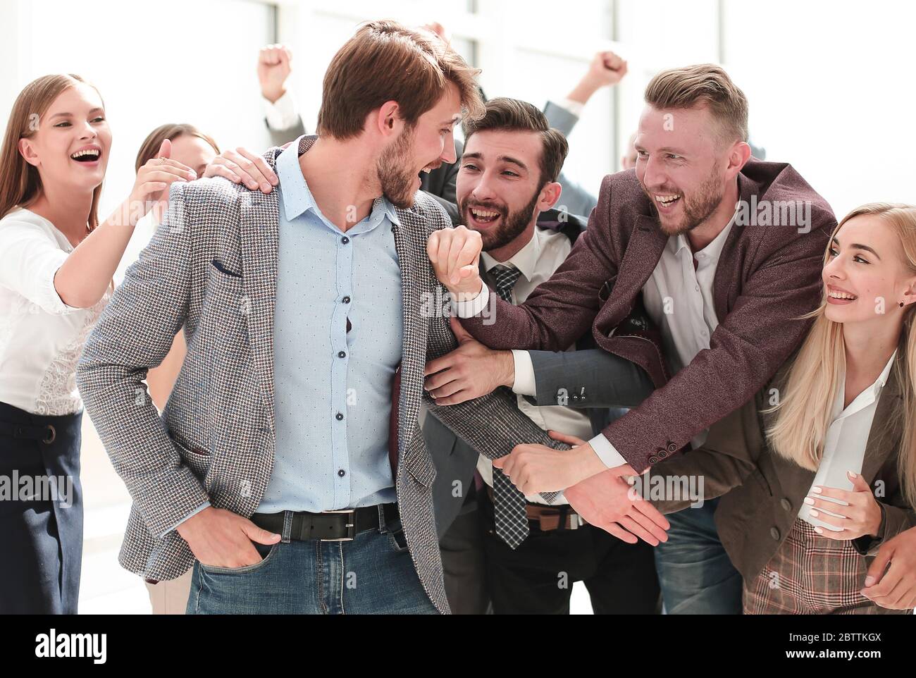 happy business team applauding the leader of a successful projec Stock ...