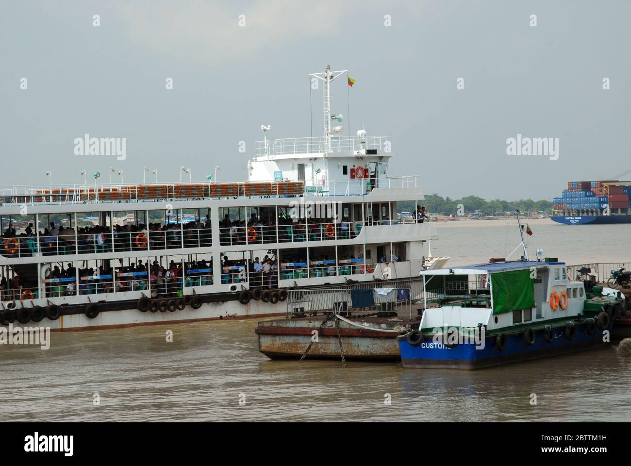 A passenger ferry arriving at Pansodan Ferry Terminal from Dala after a ...