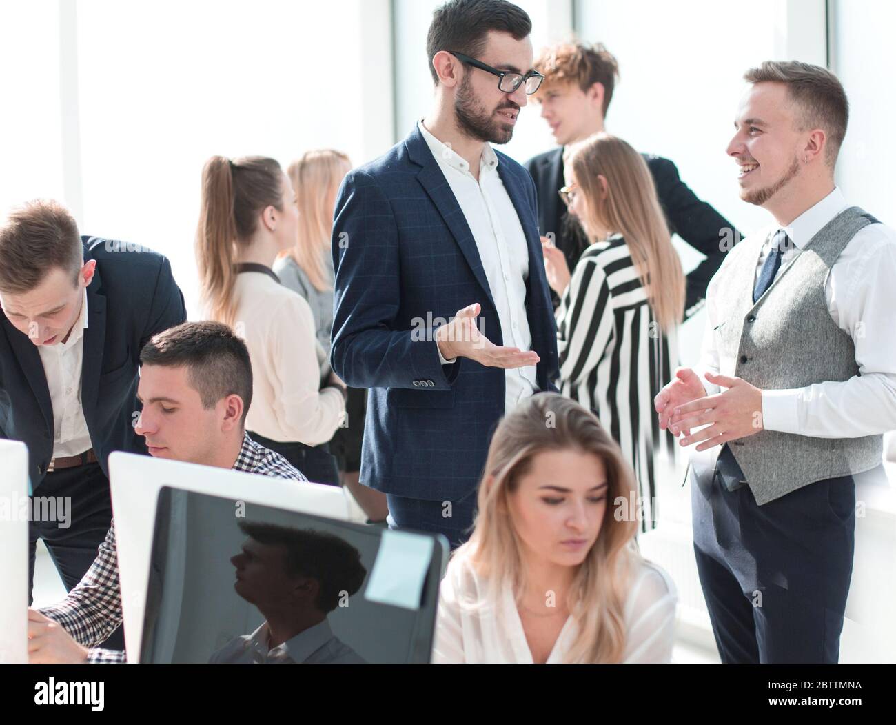 business people greet each other in the office Stock Photo - Alamy
