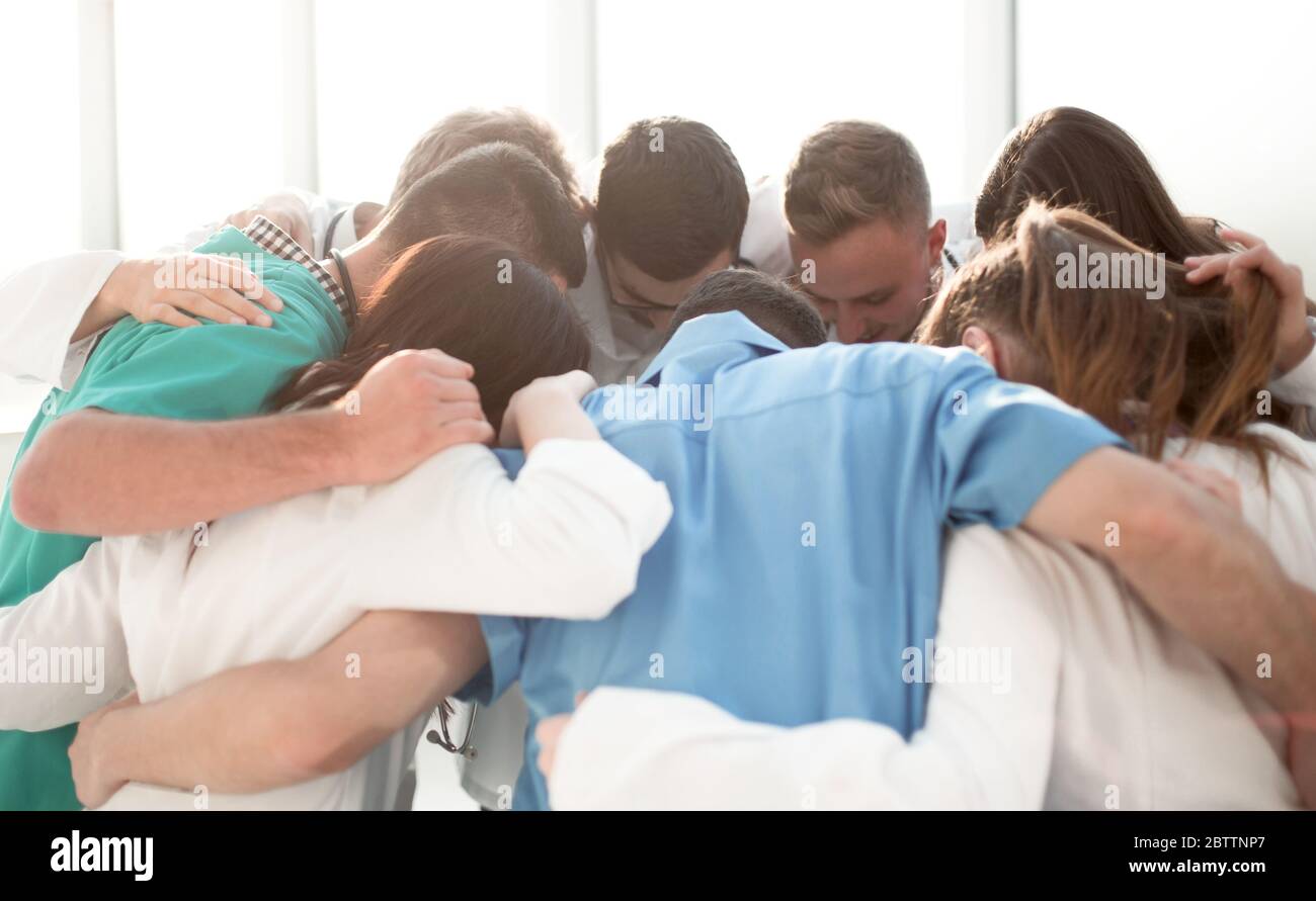 close up. group of happy doctors showing their unity Stock Photo - Alamy