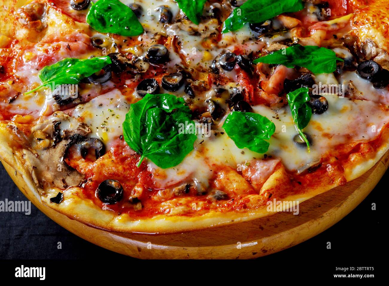 Traditional Italian pizza with fresh ingredients tomatoes, mozzarella ...