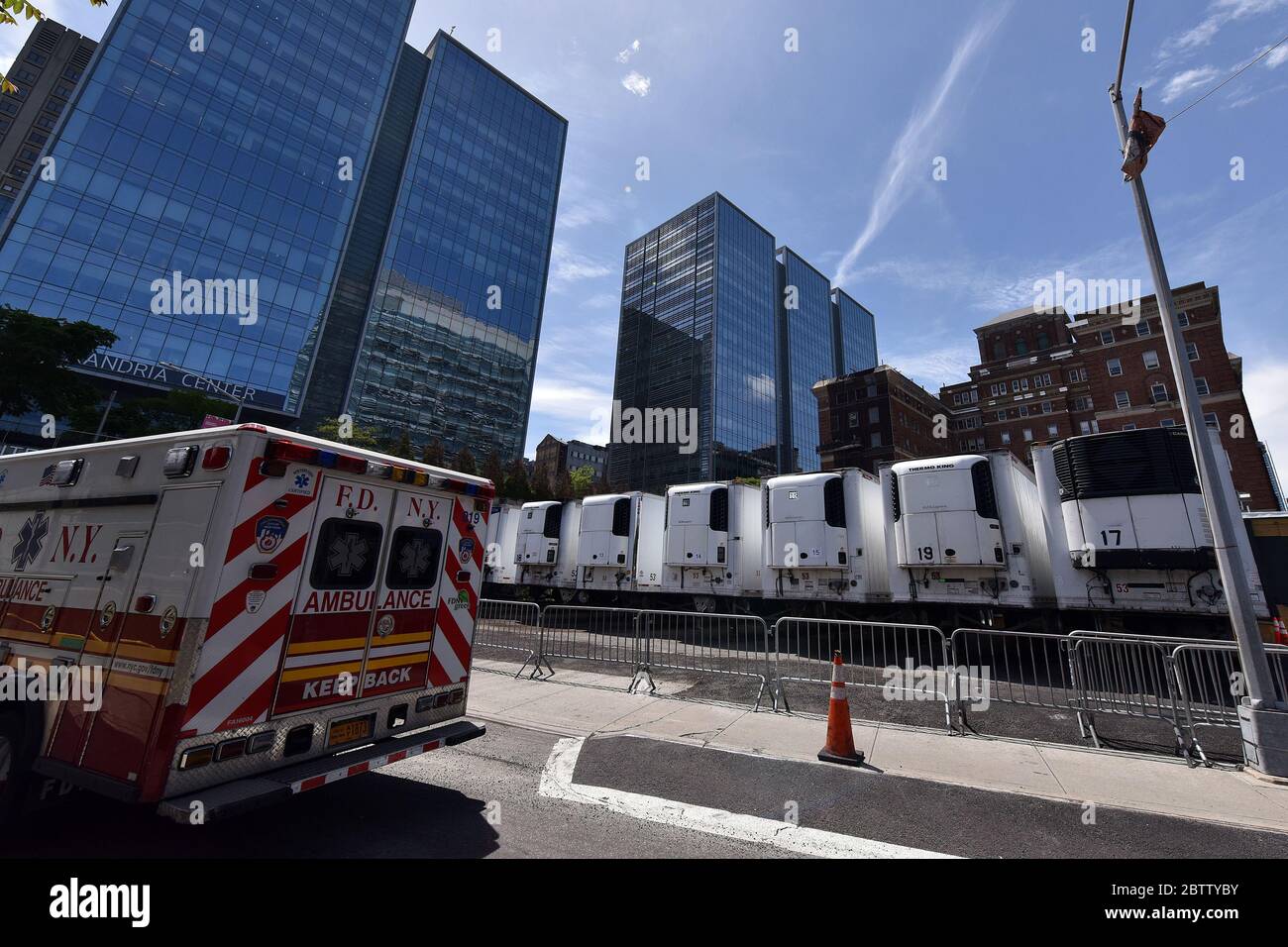 New York City, USA. 27th May, 2020. Refrigerator trucks stand outside ...
