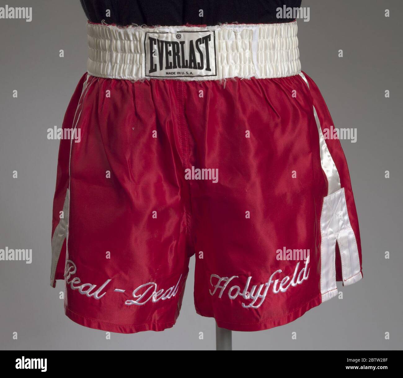 Boxing trunks worn by Evander Holyfield. Red and white boxing shorts ...