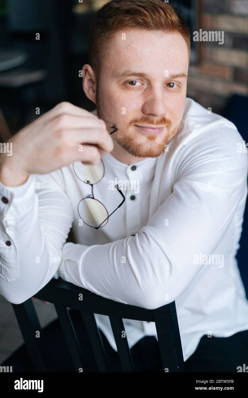 Stylish handsome man looking at the camera Stock Photo - Alamy