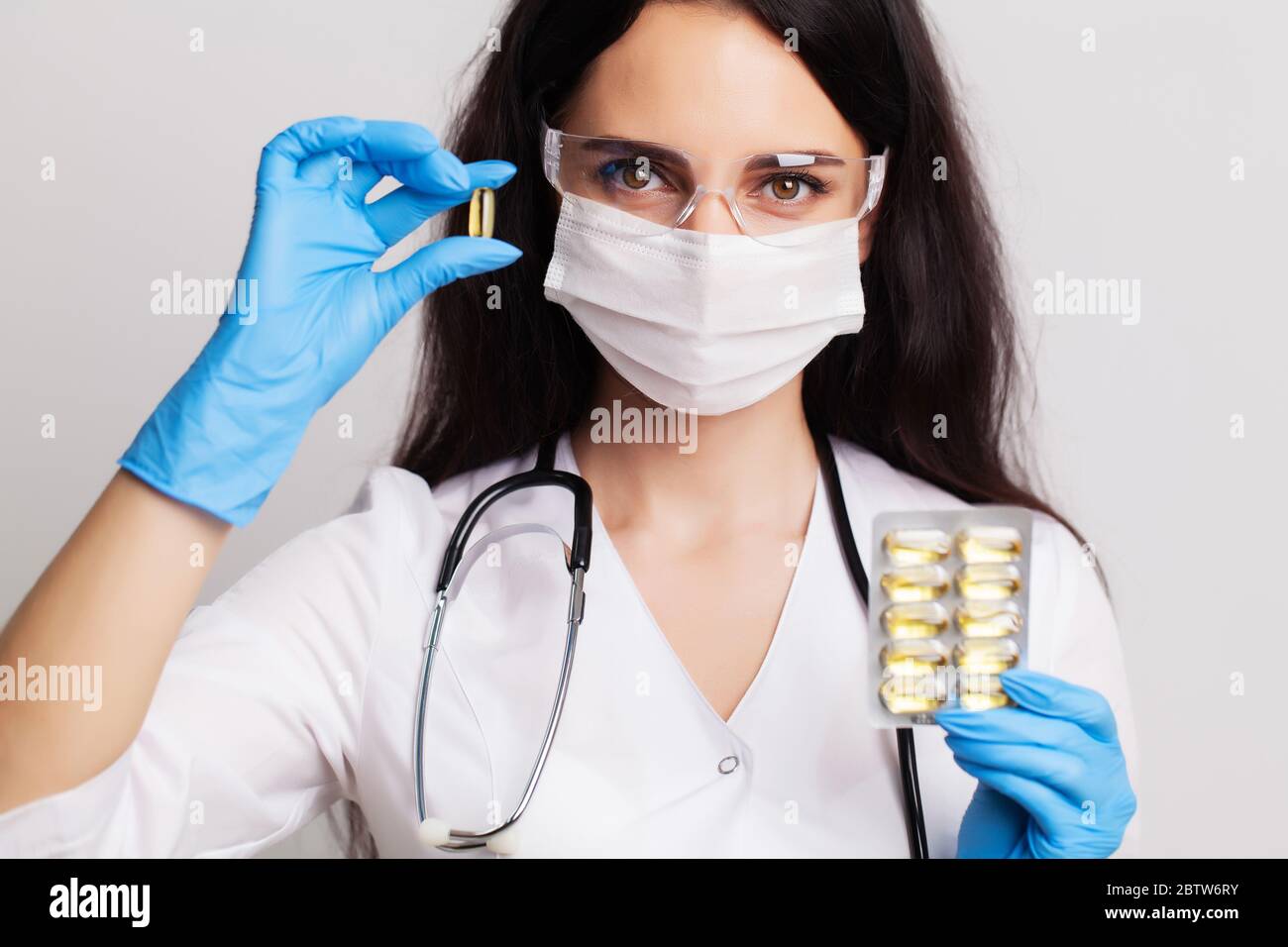 Medicine Concept Female Doctor Holding Pills Prescribed For Patient 0961
