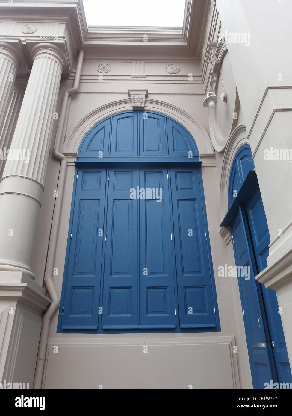 Large wooden window doors, neoclassical architecture Stock Photo - Alamy