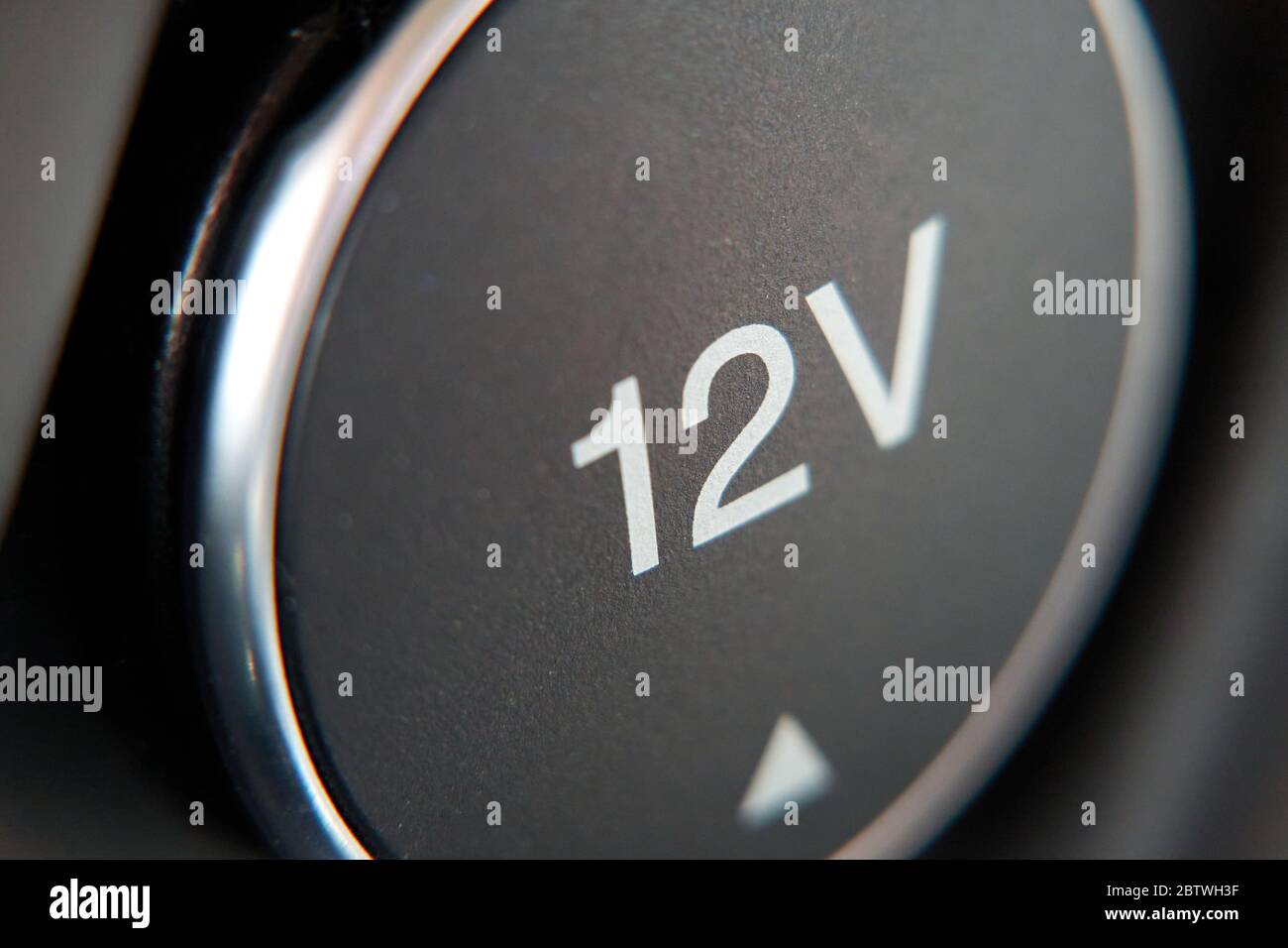 12 volt socket of an automobile Stock Photo - Alamy