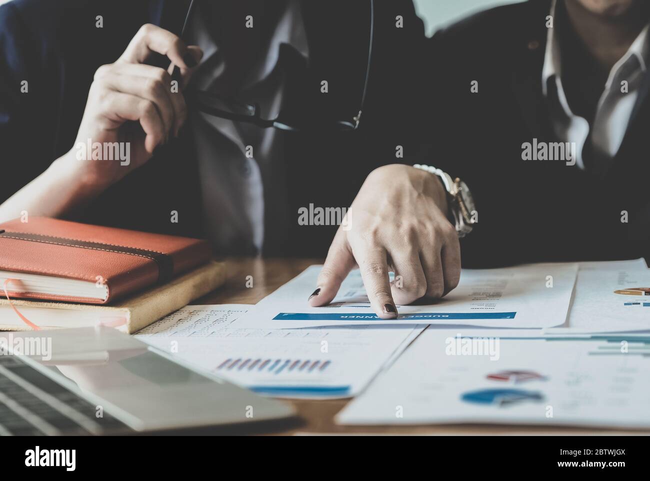 Business People Planning Strategy Analysis from financial document ...