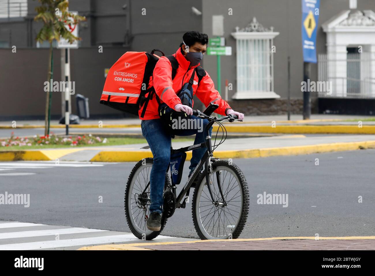 Lima, Peru. 27th May, 2020. A man working from a delivery app, Rappi ...