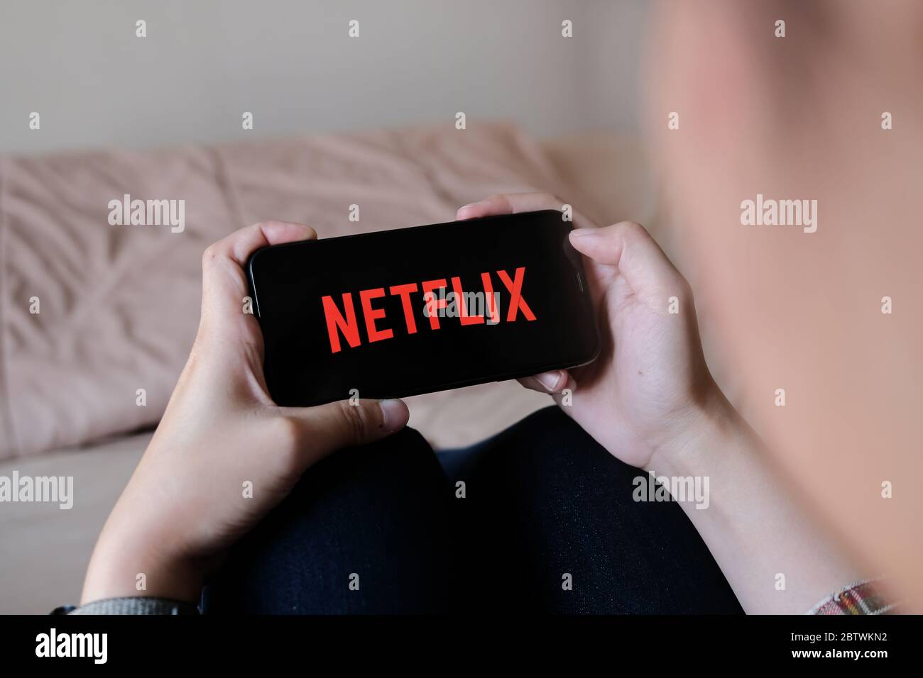 CHIANG MAI, THAILAND, MAR 29, 2020: Woman hand holding Smart Phone with ...