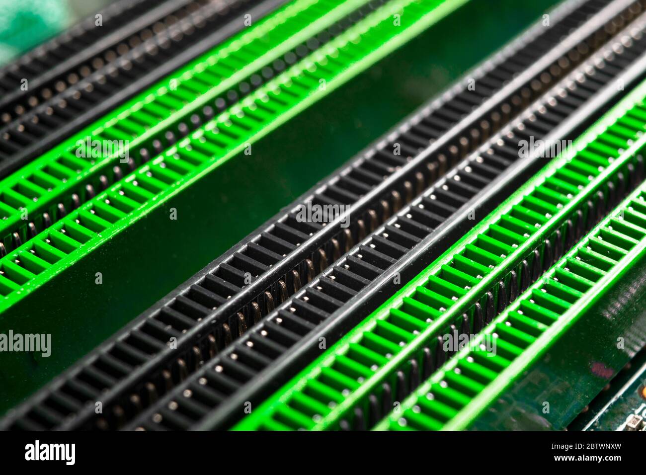 Macro shot of Circuit board with resistors microchips and electronic components. Computer ...