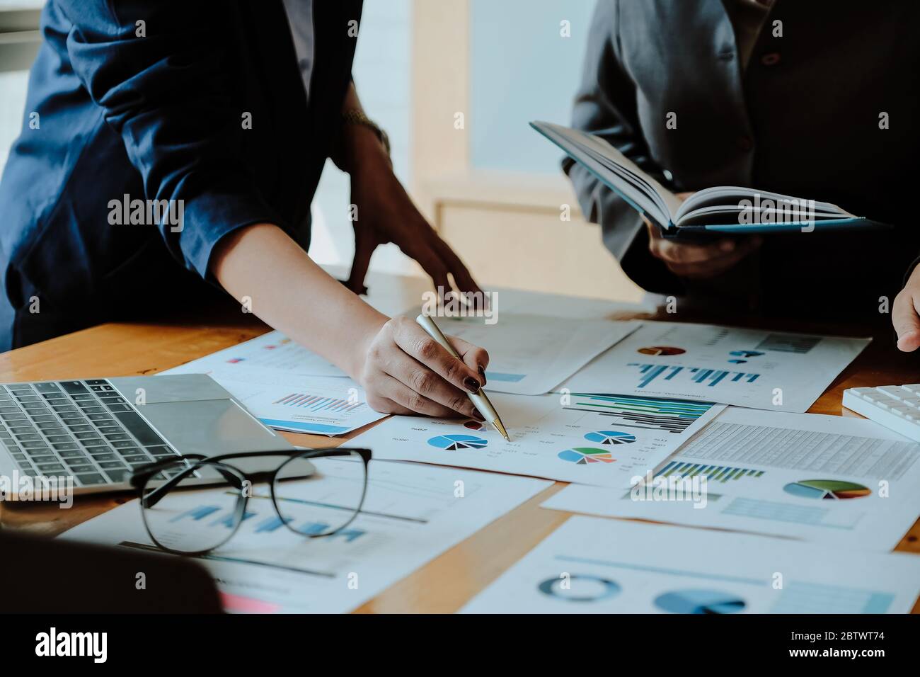 Business People Planning Strategy Analysis from financial document ...